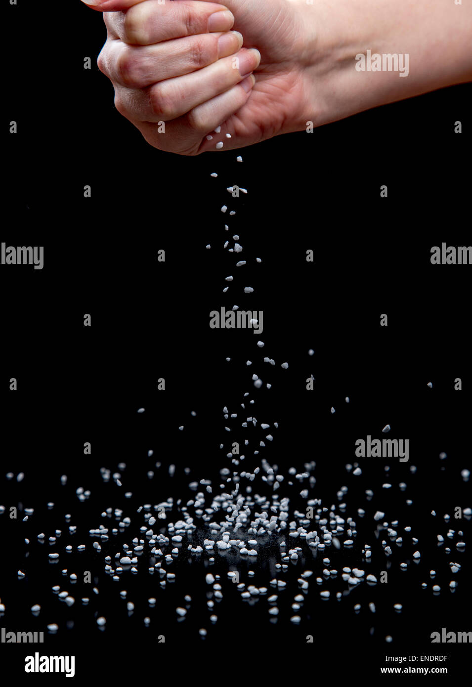 Hand dropping white background hi-res stock photography and images - Alamy