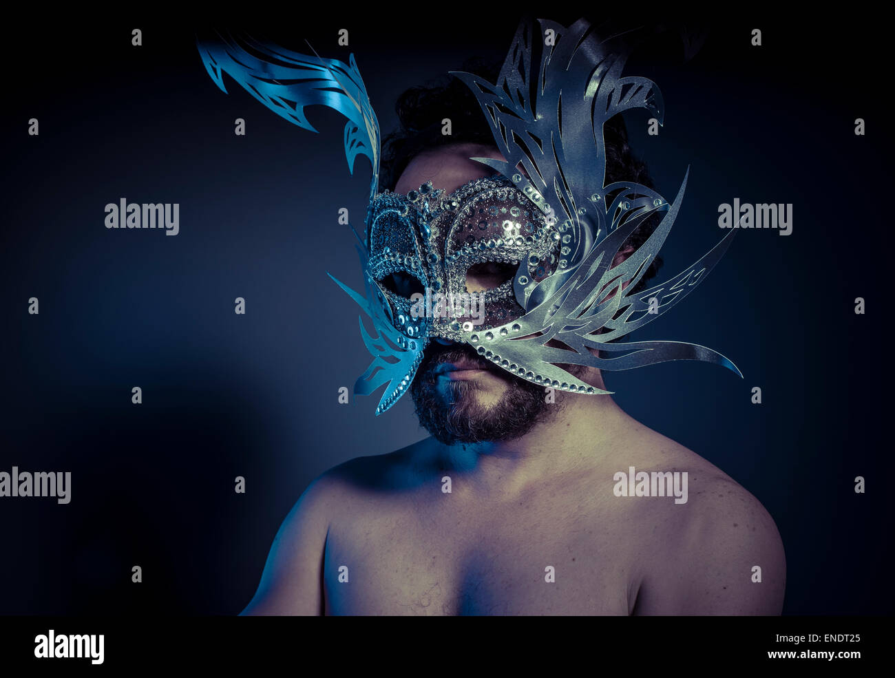 Treasure, jewels and silver. Man with mask of precious metals Stock ...