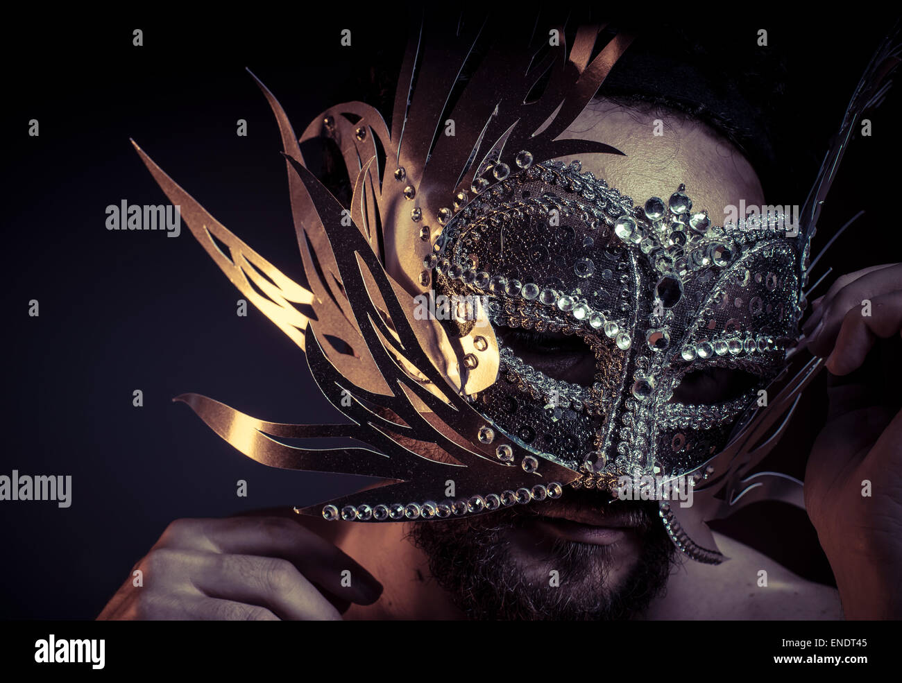 Treasure, jewels and silver. Man with mask of precious metals Stock ...