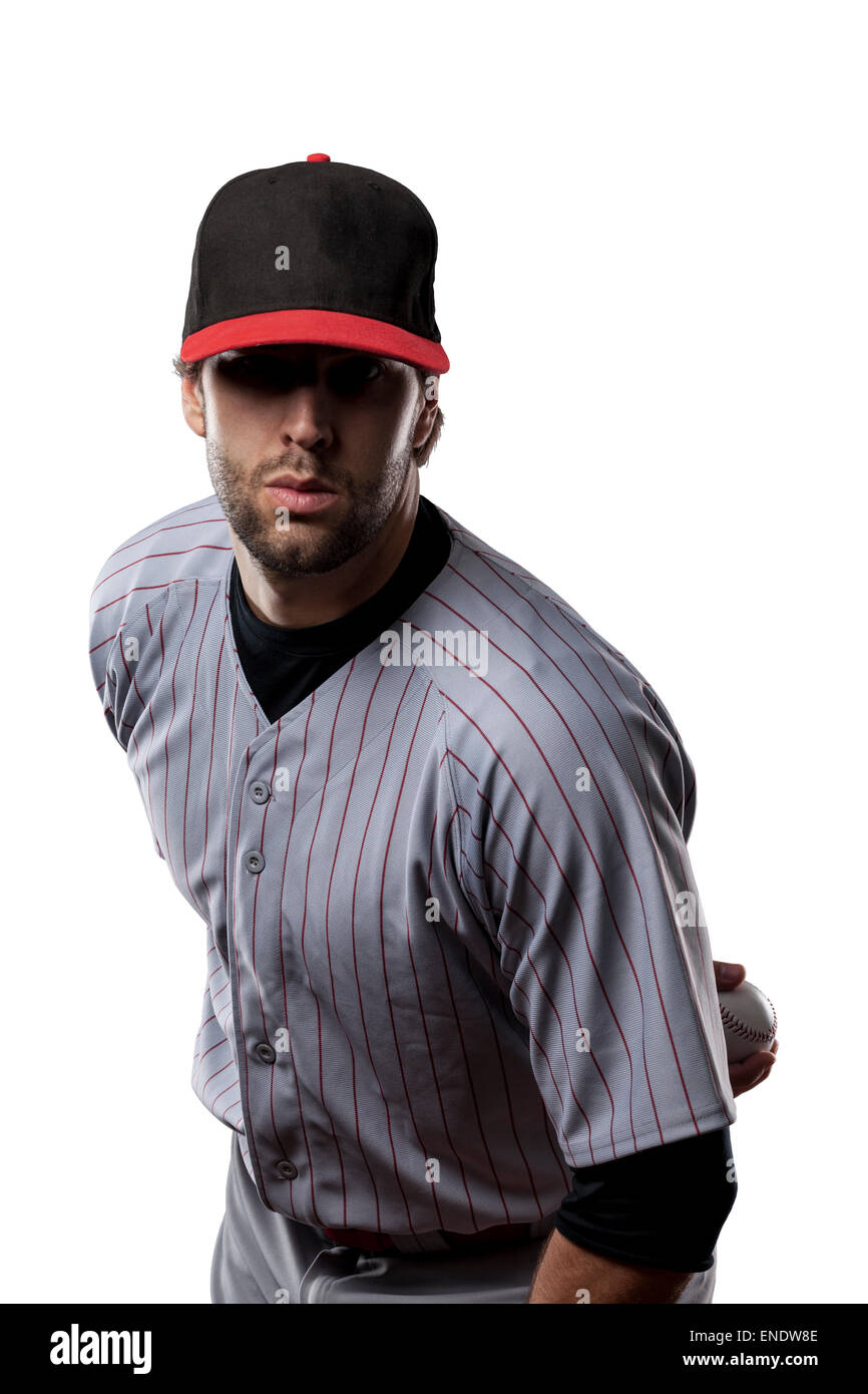 Baseball Player in red uniform, on a white background Stock Photo - Alamy