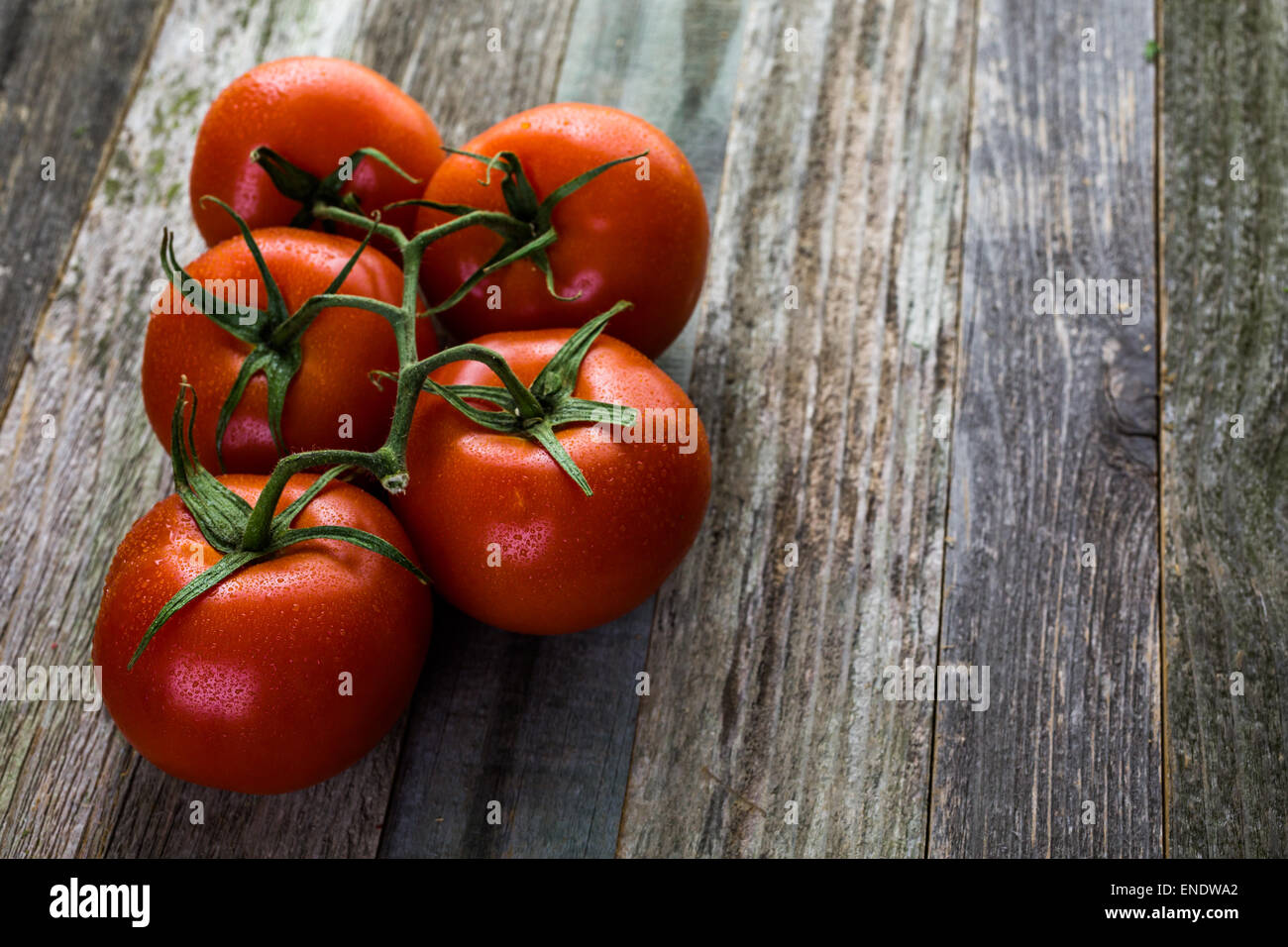 Fresh organic vegetable in season on old farm table Stock Photo - Alamy