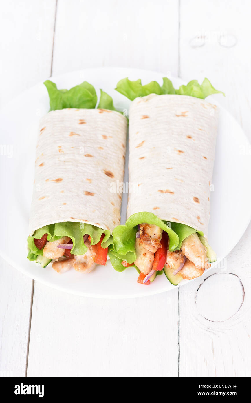 Fresh wrap sandwiches with chicken and vegetables, top view Stock Photo ...