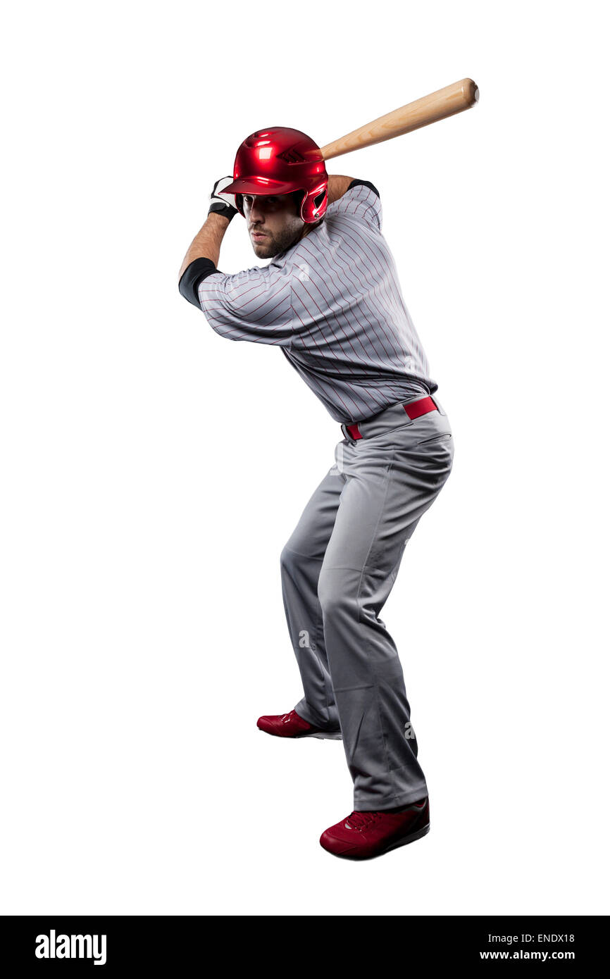 Baseball Player in red uniform, on a white background Stock Photo - Alamy