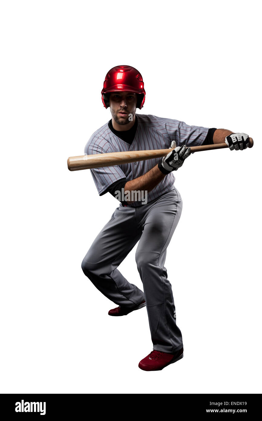 Baseball Player in red uniform, on a white background Stock Photo - Alamy
