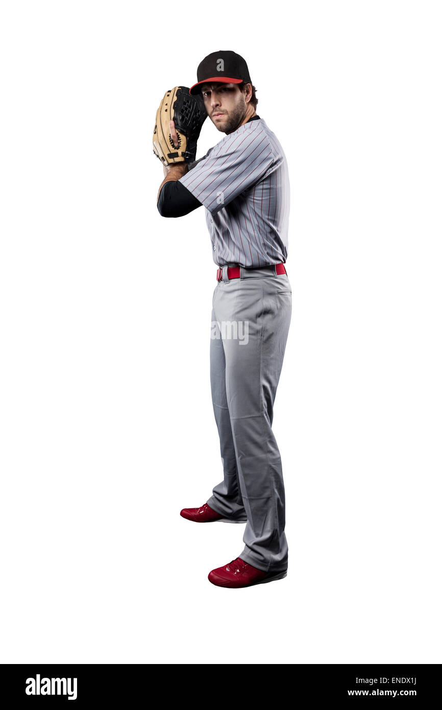 Baseball Player in red uniform, on a white background Stock Photo - Alamy
