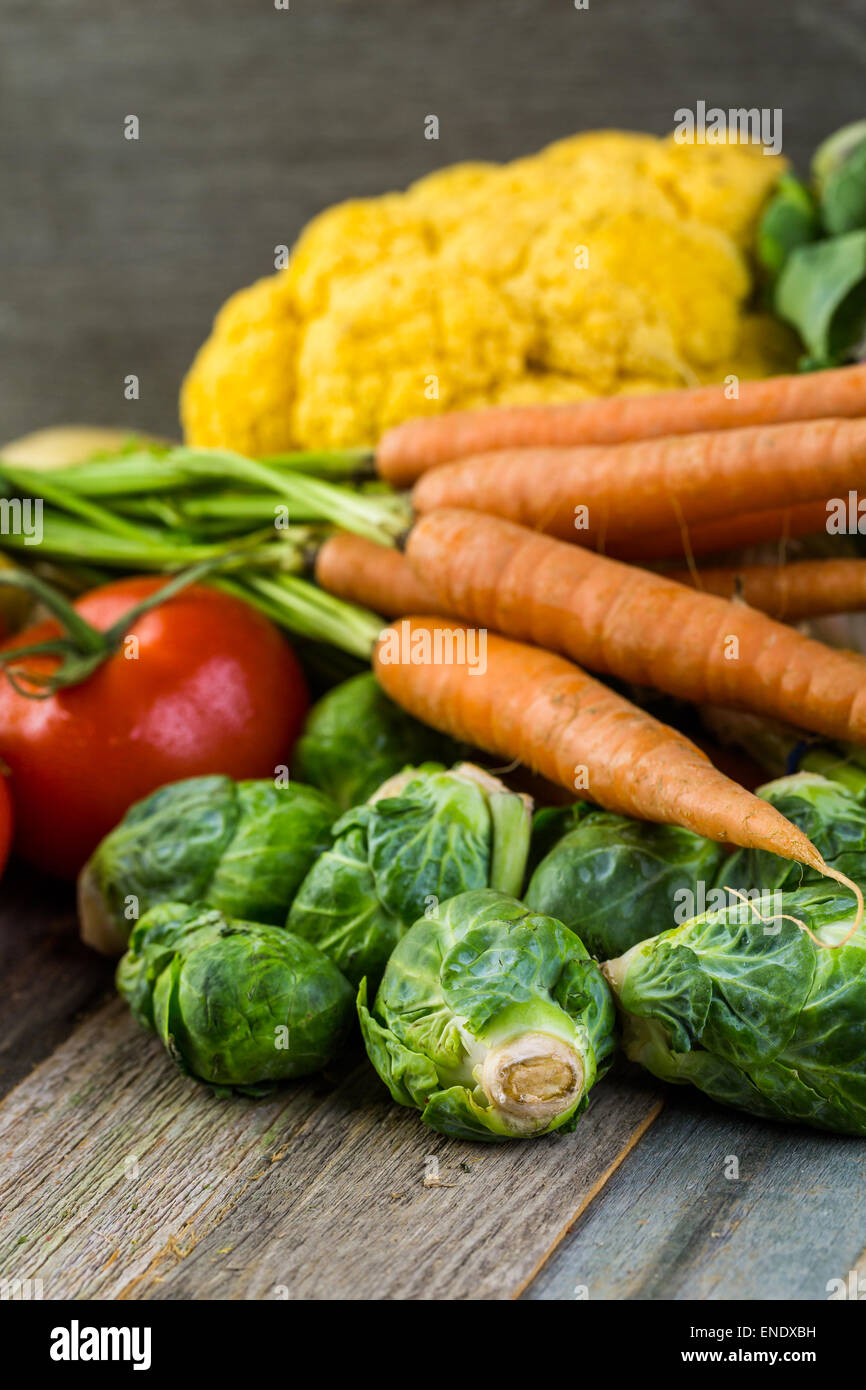 Fresh organic vegetable in season on old farm table Stock Photo - Alamy