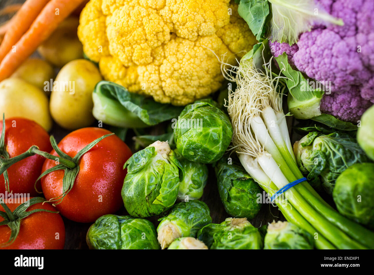 Fresh organic vegetable in season on old farm table Stock Photo - Alamy