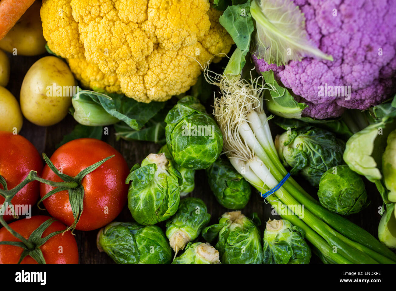 Fresh organic vegetable in season on old farm table Stock Photo - Alamy