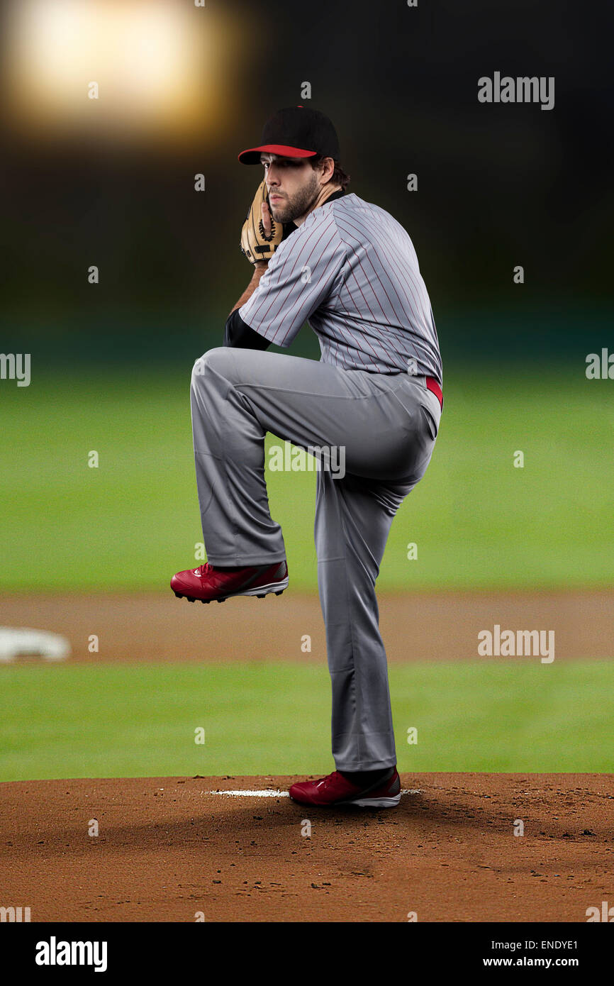 Pitcher Player throwing a ball, on a baseball Stadium Stock Photo - Alamy