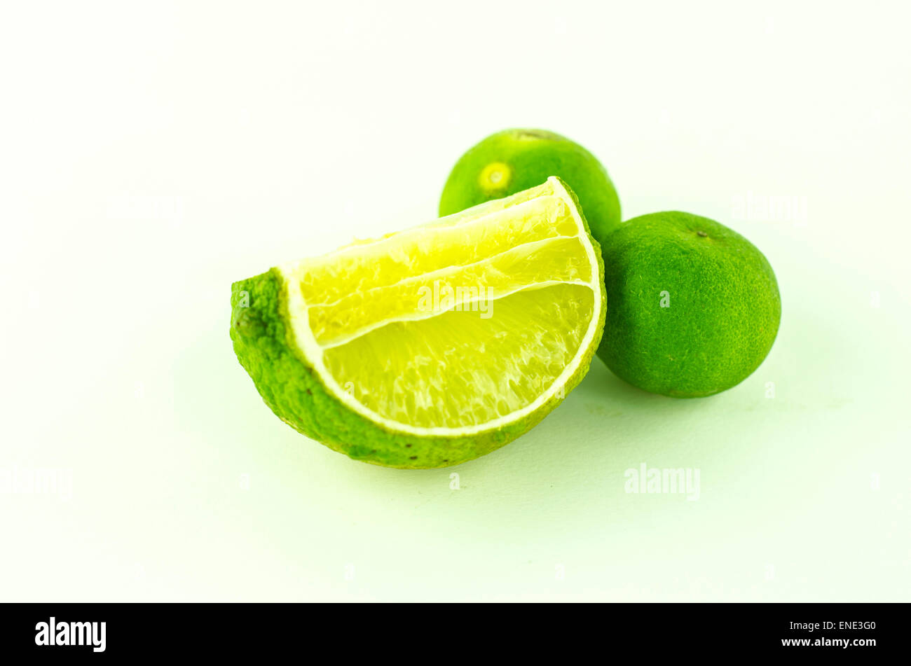 green two lime isolated on white background Stock Photo - Alamy