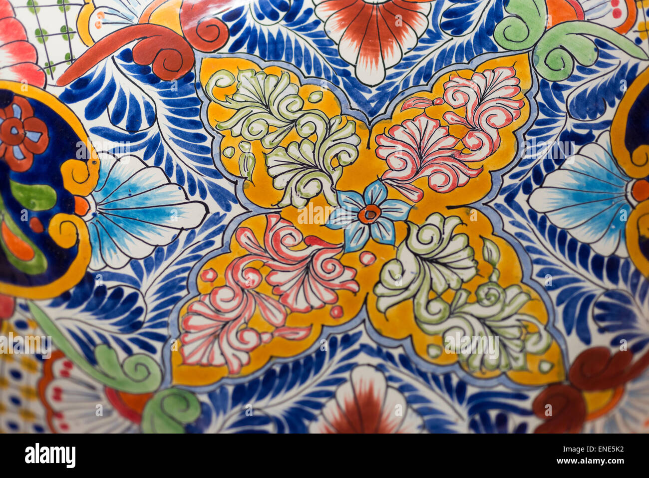 Floral designs hand painted on pottery in Mexico Stock Photo - Alamy