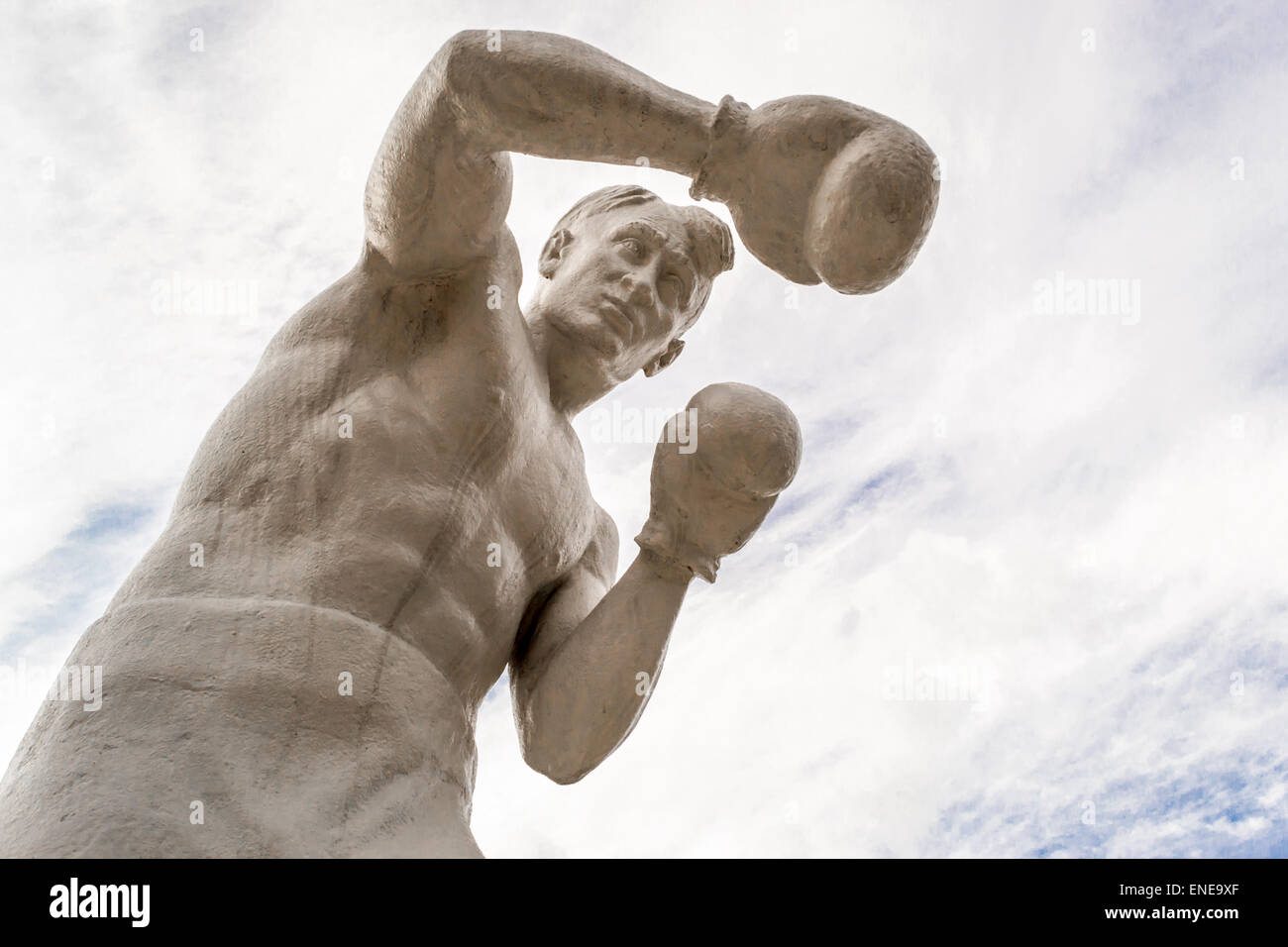 Male statue boxer with gloves throwing punches Stock Photo - Alamy