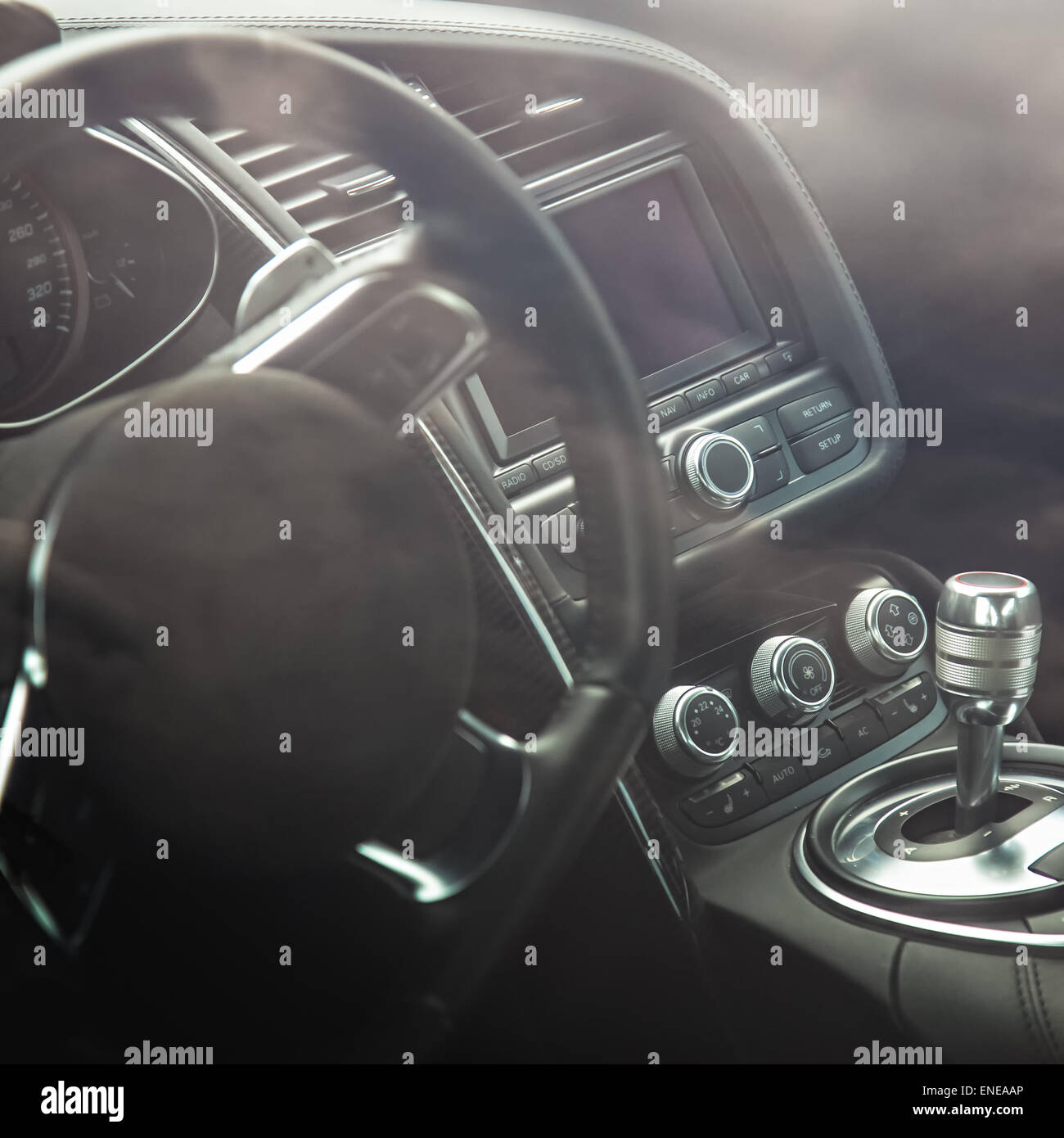 Steering wheel in interior of the sports car Stock Photo - Alamy