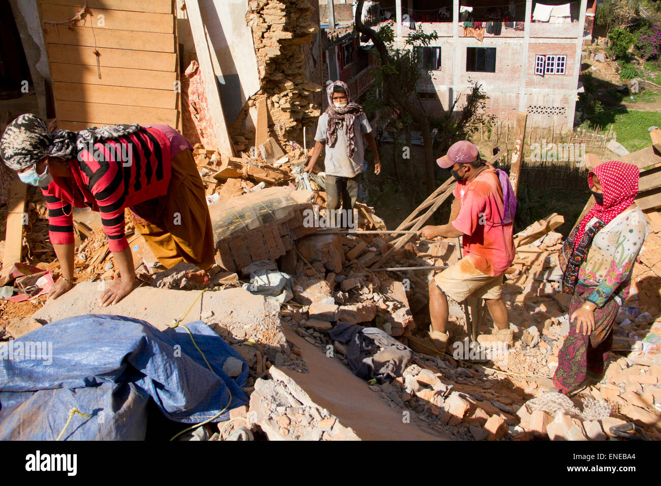 Nepal. 3rd May, 2015. People salvage a destroyed building in Chautara ...