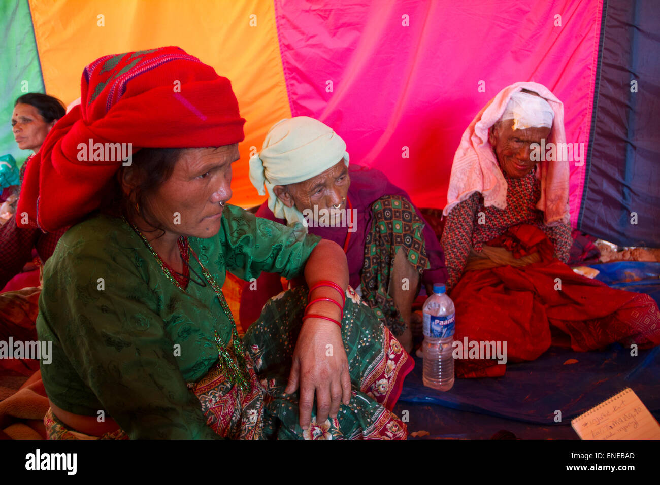 Nepal. 3rd May, 2015. Women rest at field hospital in Chautara, Nepal ...