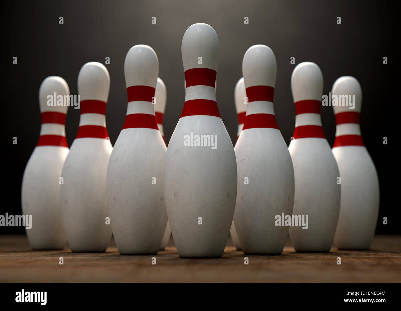 An arrangement of white and red used vintage bowling pins resting on a ...