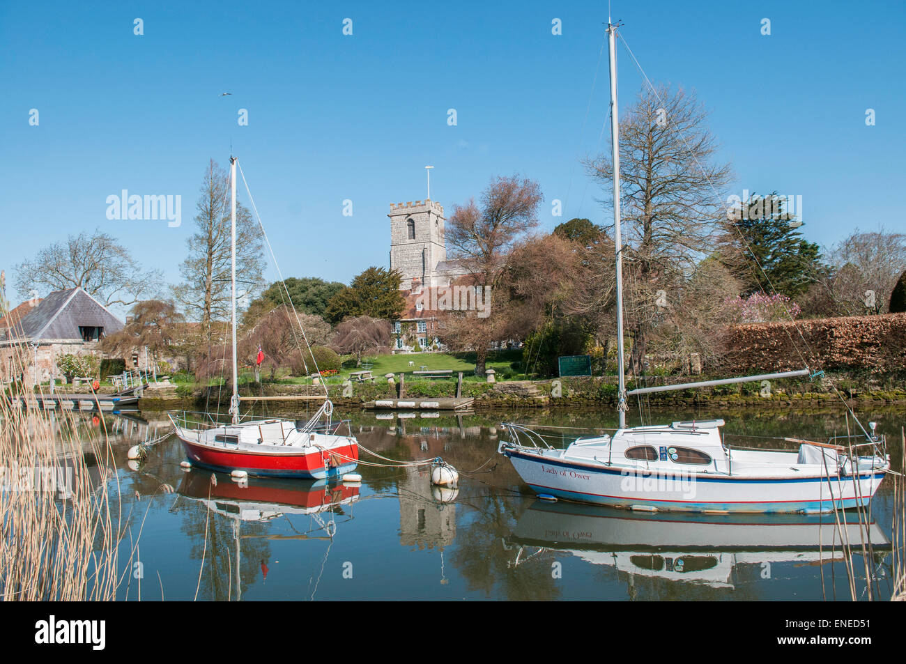Boats on the Wareham river, with the Priory Hotel and Lady St Mary ...