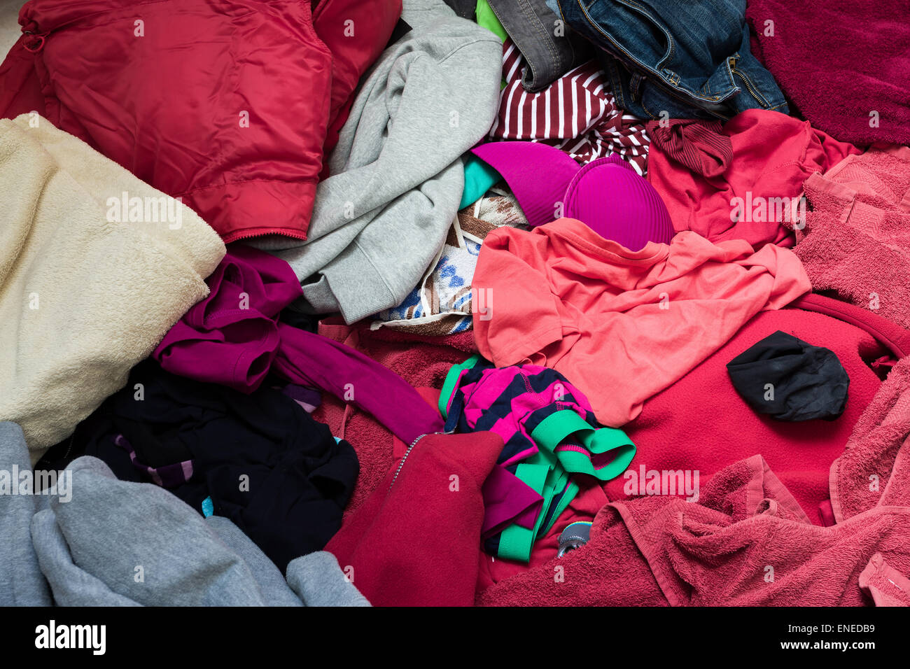 pile of dirty clothes ready for the wash in home bathroom Stock Photo ...