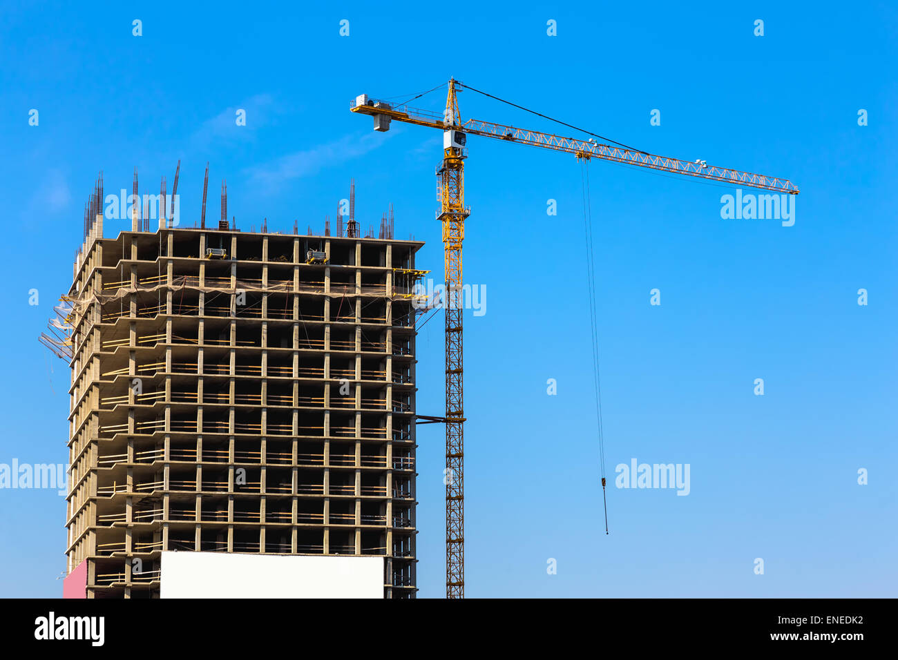 Construction crane on building site on sky background Stock Photo - Alamy