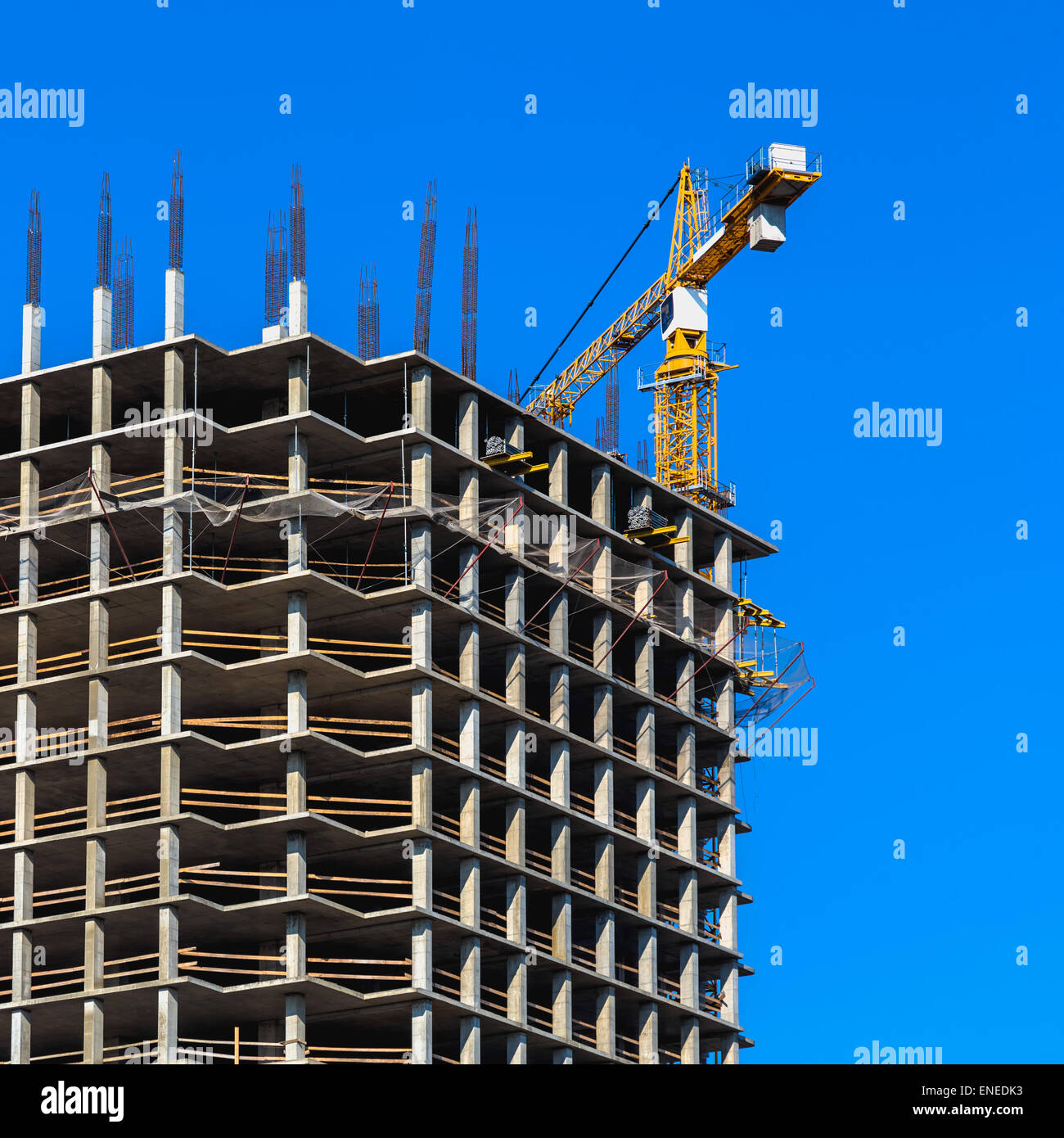 Building construction on blue sky background Stock Photo - Alamy