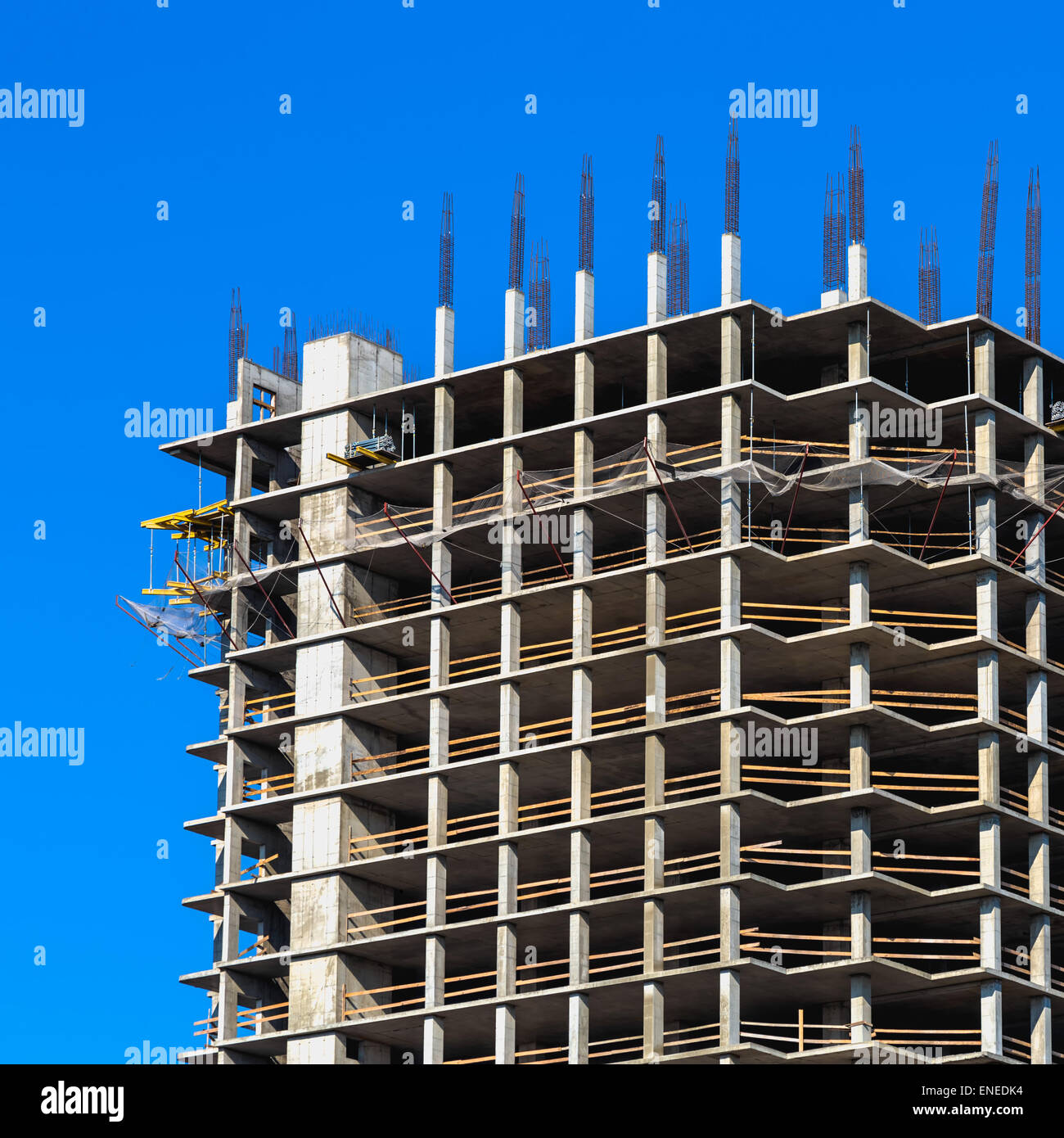Building construction on blue sky background Stock Photo - Alamy
