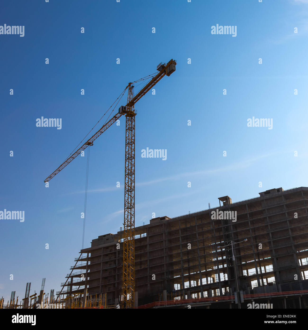 Construction crane on building site on sky background Stock Photo - Alamy