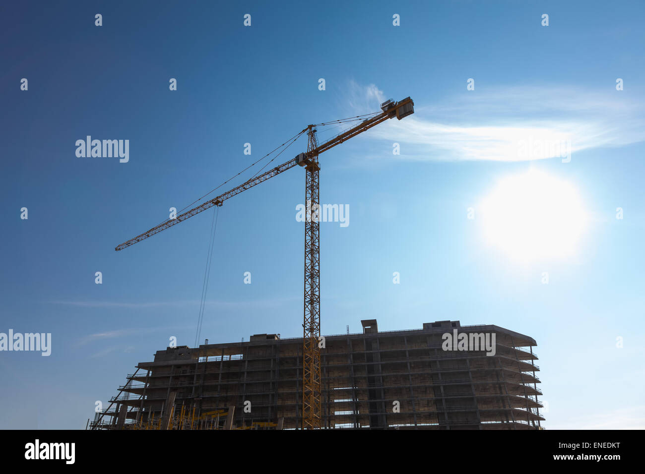 Construction crane on building site on sky background Stock Photo - Alamy