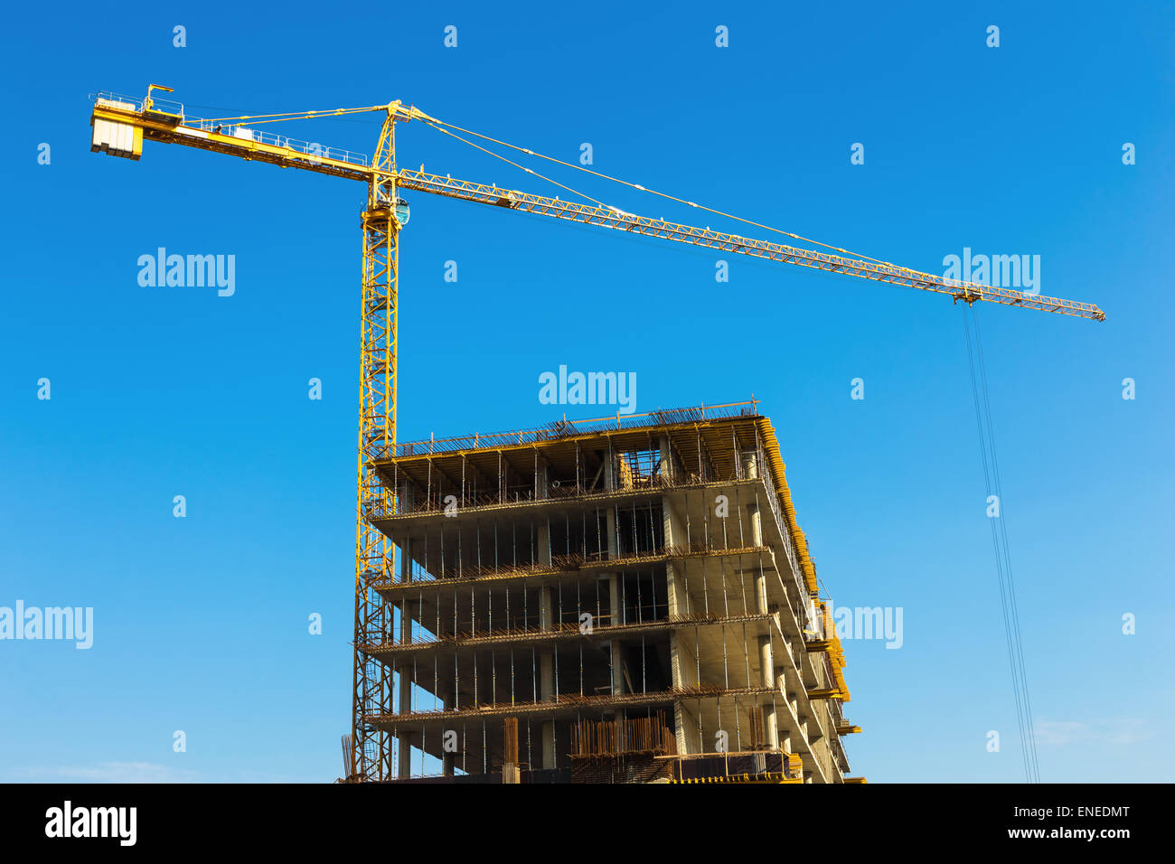 Construction crane on building site on sky background Stock Photo - Alamy