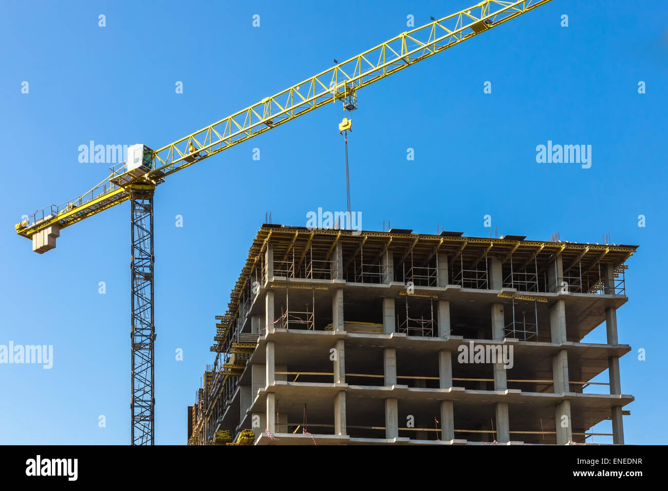 Construction crane on building site on sky background Stock Photo - Alamy
