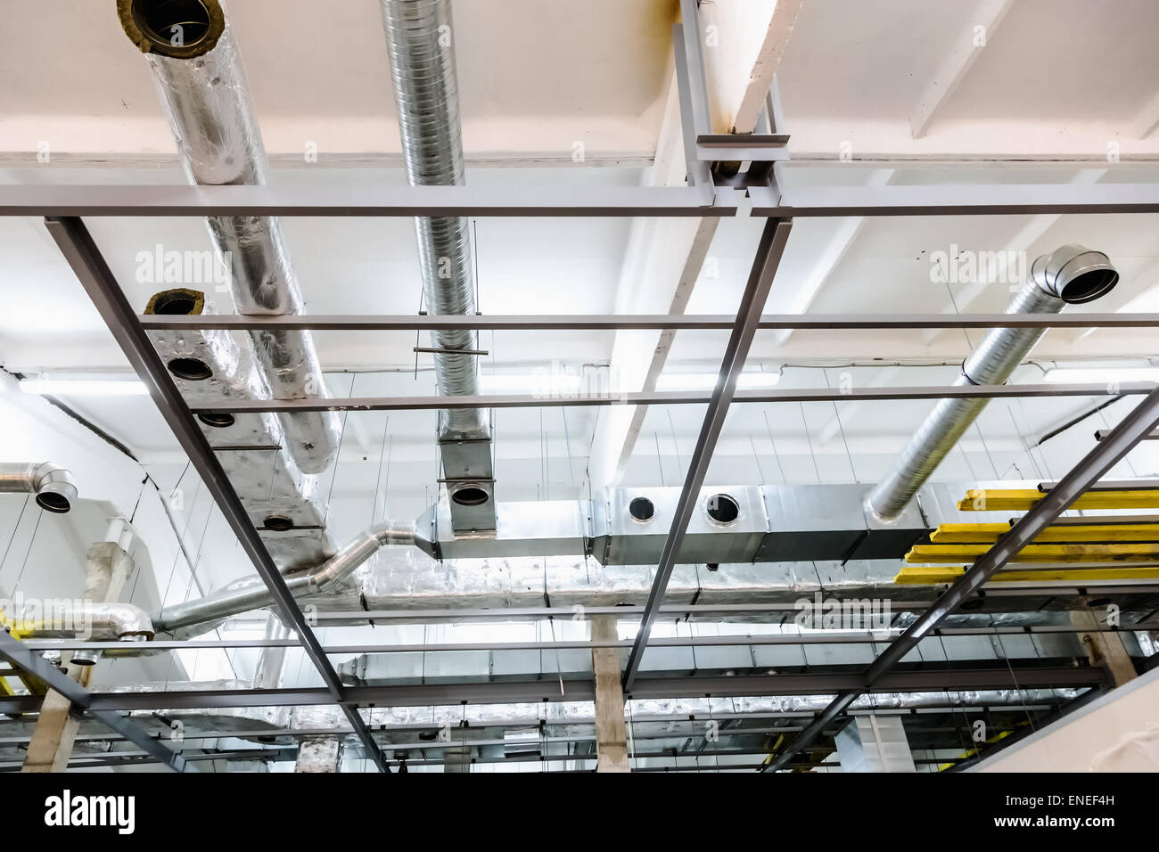 Rooftop with pipes of industrial building under construction Stock ...