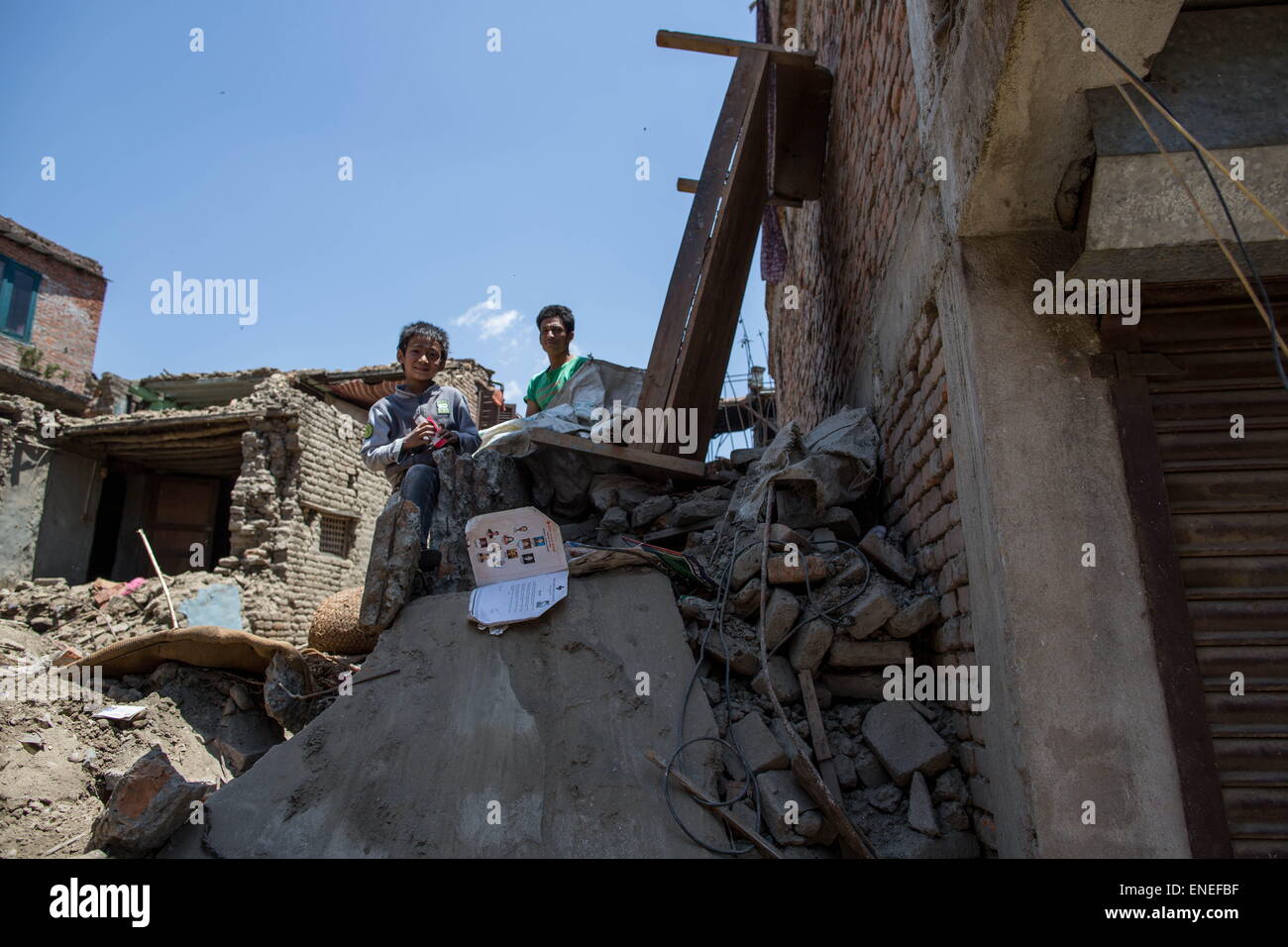 Kathmandu, Nepal. 3rd May, 2015. A father and his son is pictured in ...