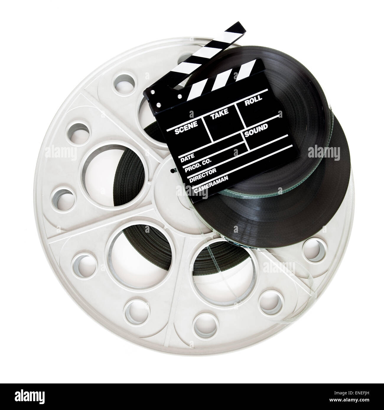 Movie clapper on 35 mm cinema film reels isolated on white background ...