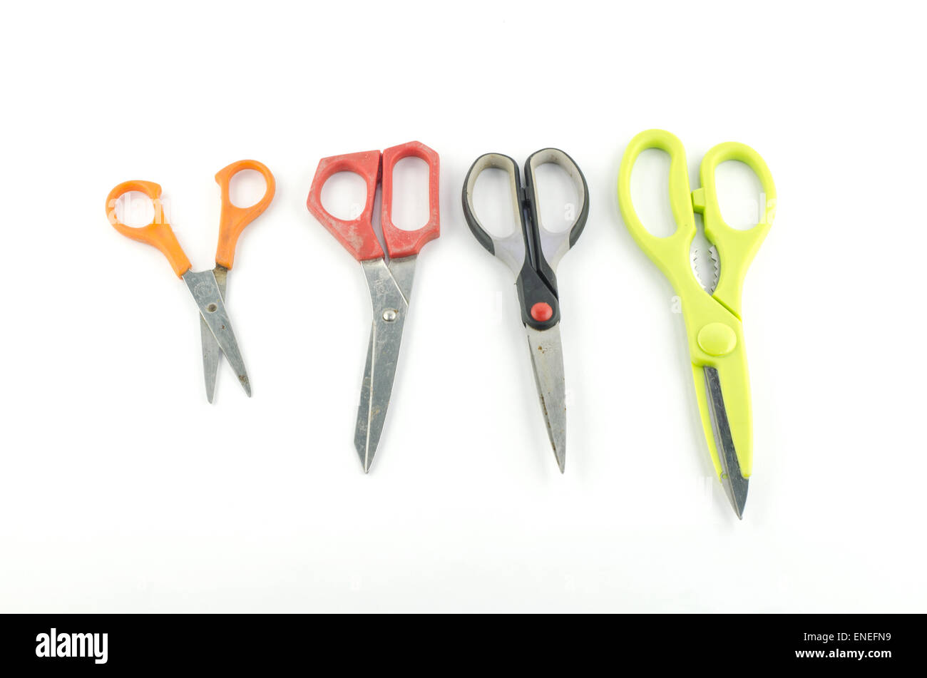 four Scissors isolated with white background Stock Photo - Alamy