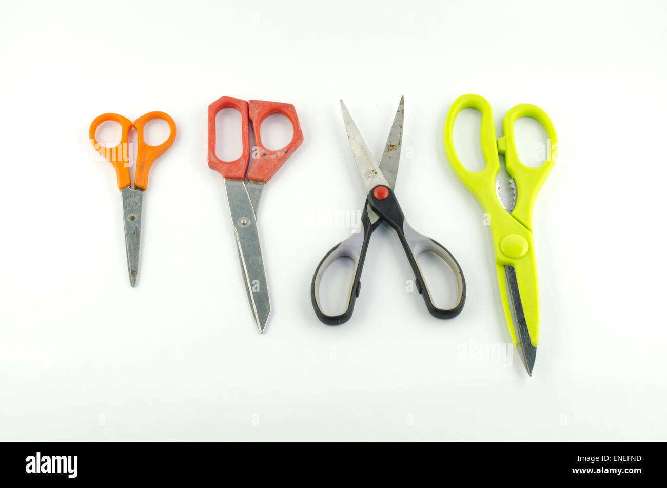 four used Scissors isolated with white background Stock Photo - Alamy