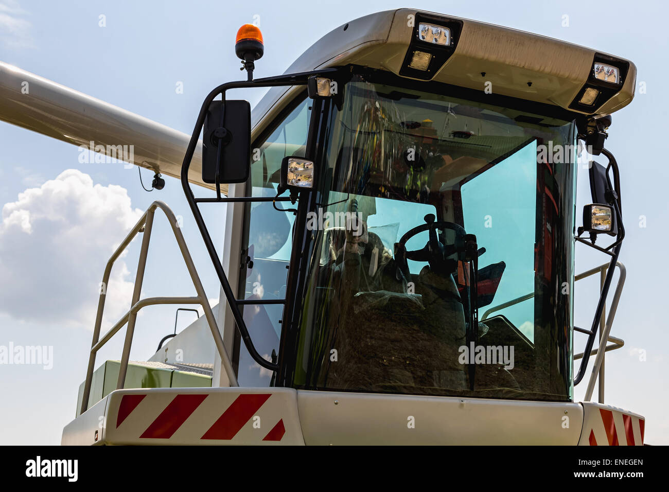 Cab of combine harvester closeup on sky background Stock Photo - Alamy