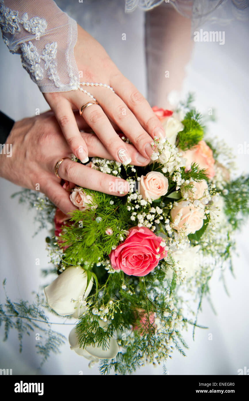 hands of the bride and groom together Stock Photo - Alamy