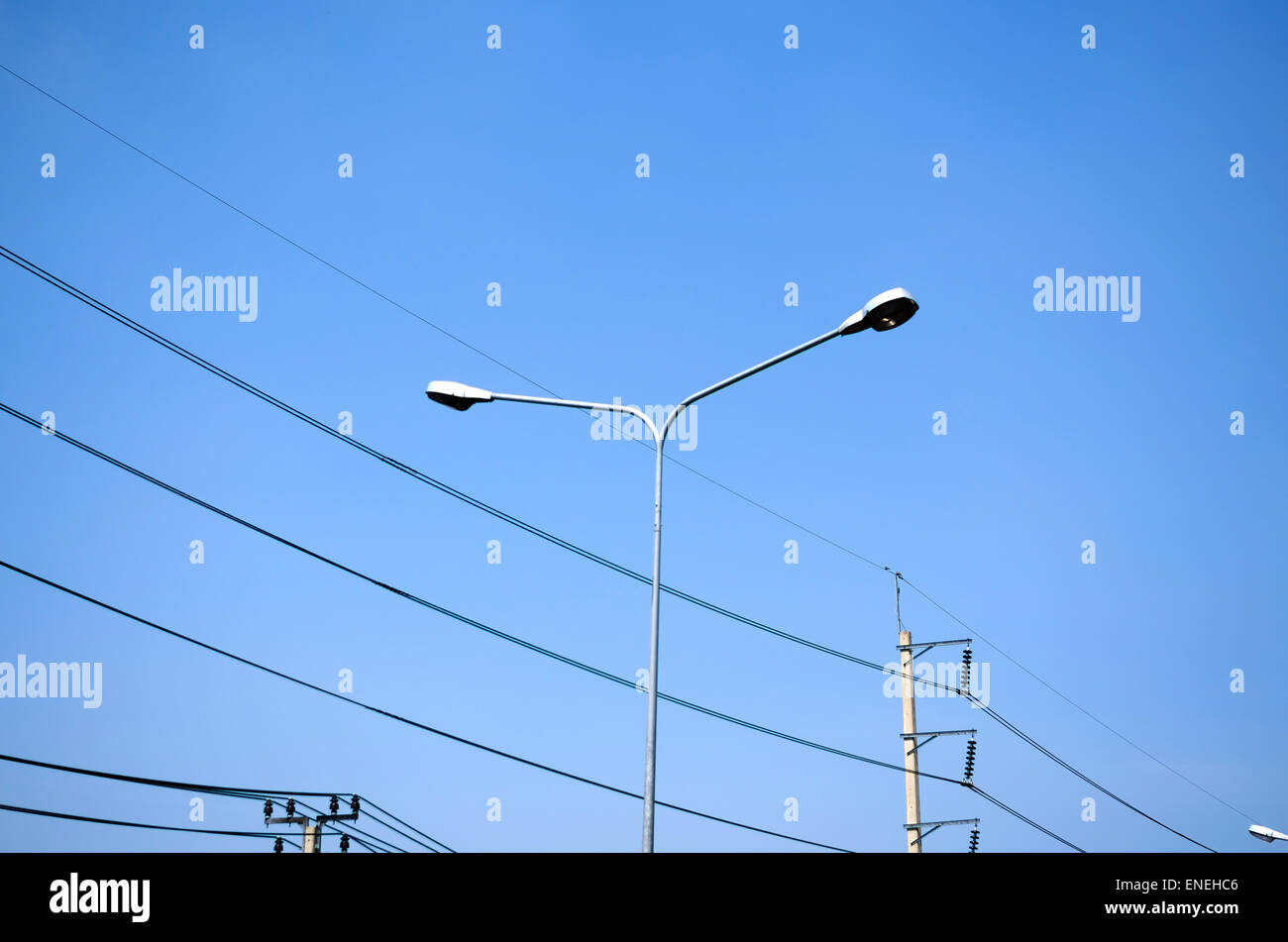 street light and Electricity post on blue sky Stock Photo - Alamy