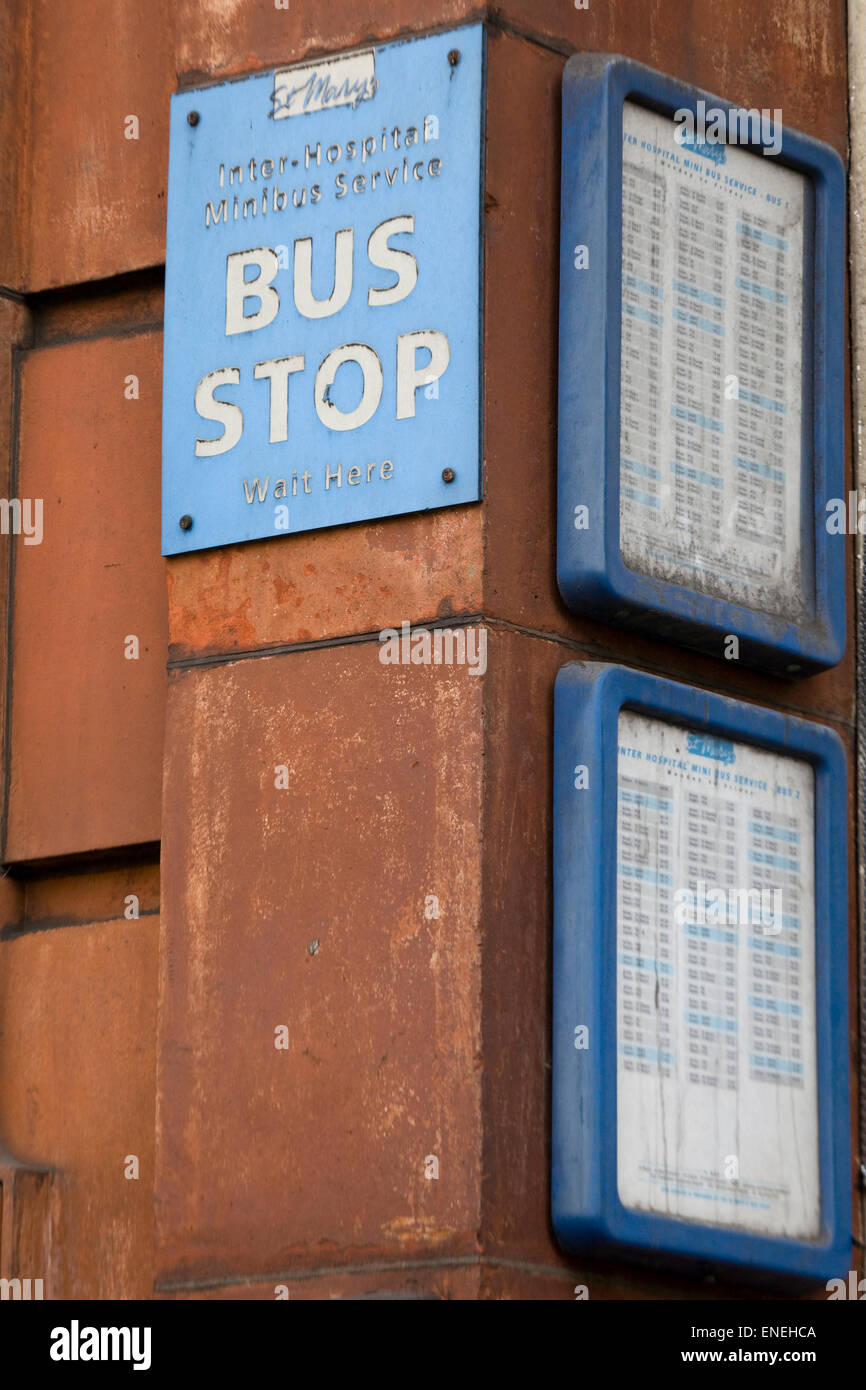 Public information Sign Hospital Bus stop and timetable on a wall Stock ...