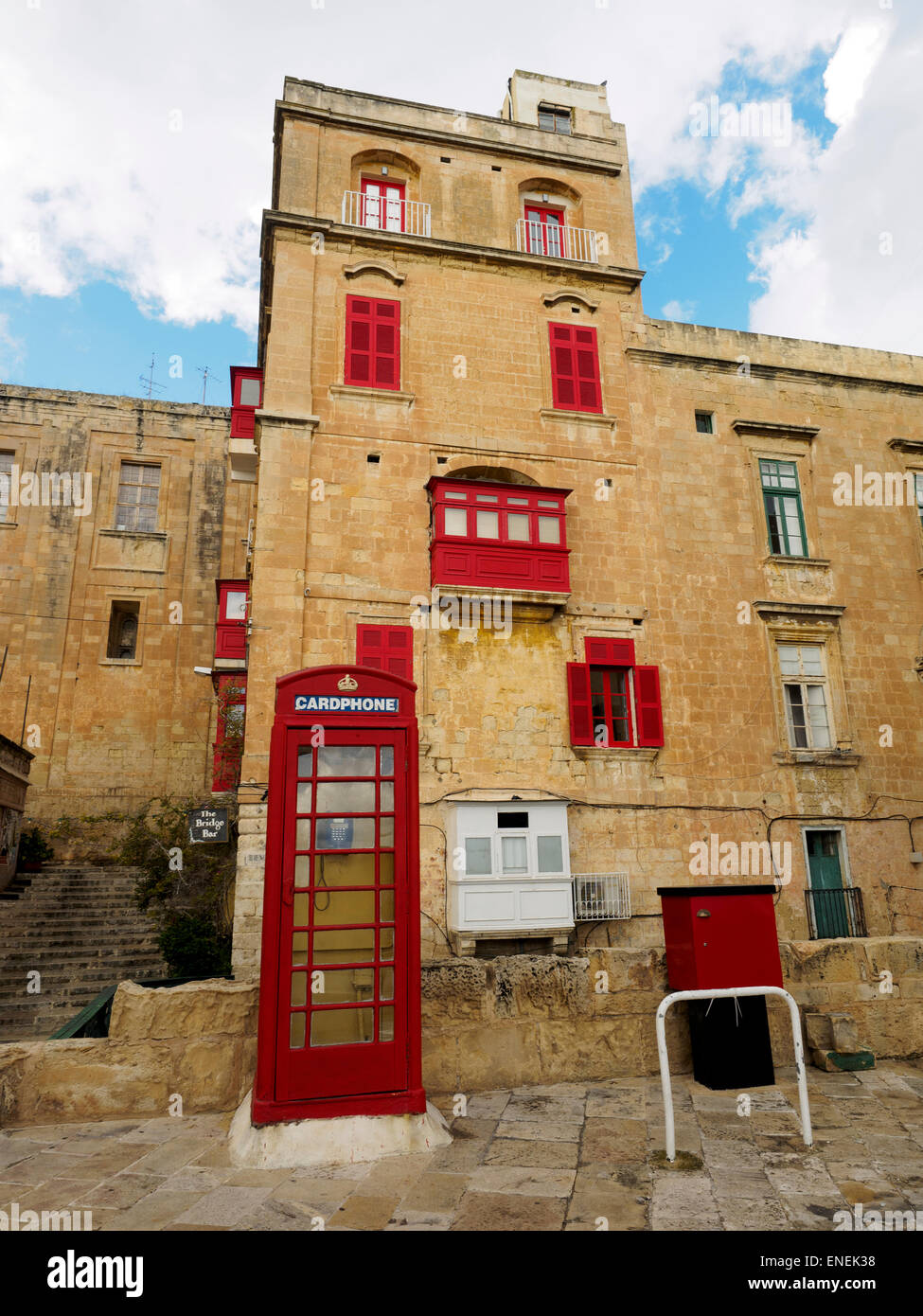 Building facade and red telephone box - Valletta, Malta Stock Photo - Alamy