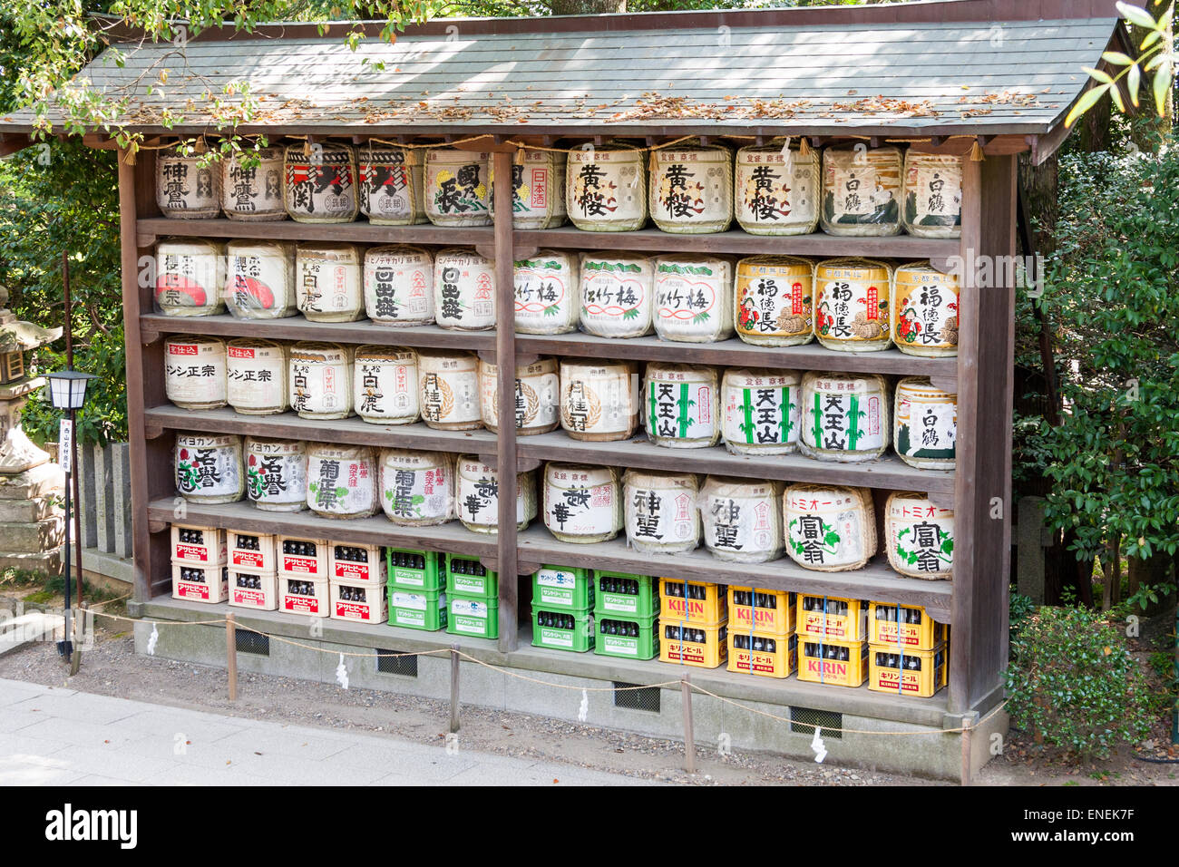 The Shinto Nagaoka tenmangu shrine in Kyoto, Japan. Open rack of sake ...