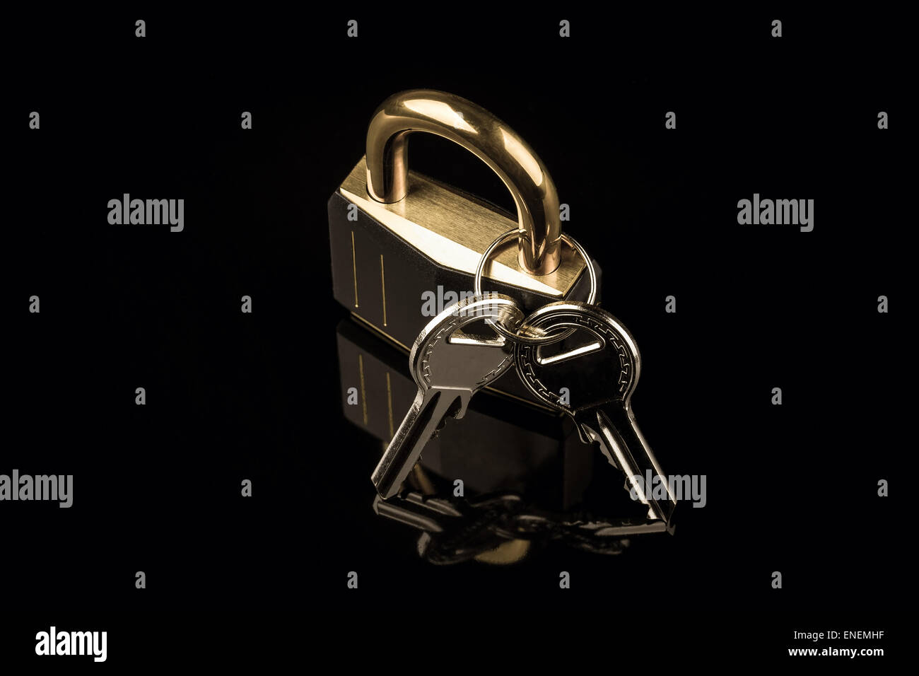 hinged lock with keys on black background Stock Photo - Alamy