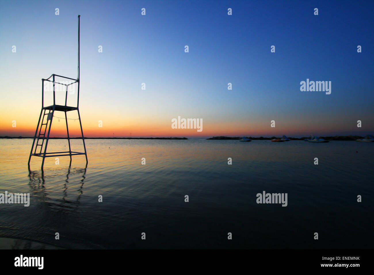 Sunset in the beach without lifeguard Stock Photo - Alamy