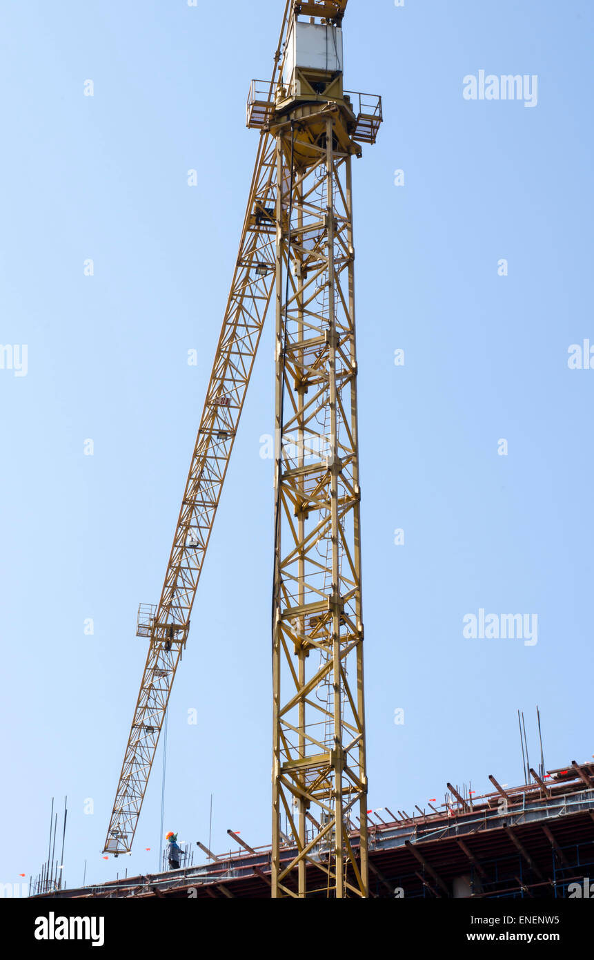crane on blue sky background Stock Photo - Alamy