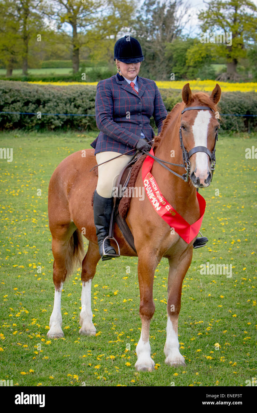 Riders and their horses take part in a local Riding Club Show held at ...