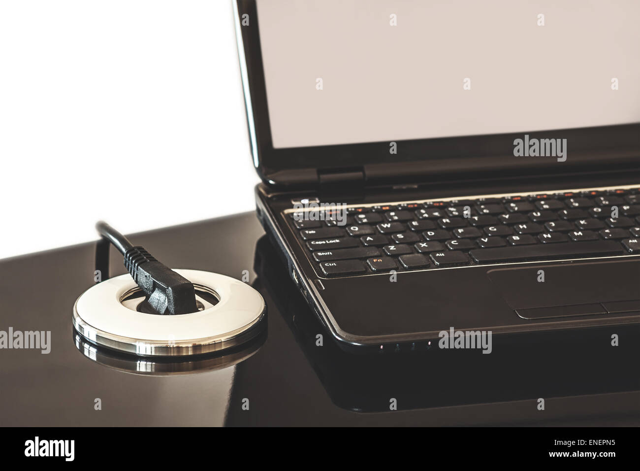 Details of an electric plug built in table Stock Photo - Alamy