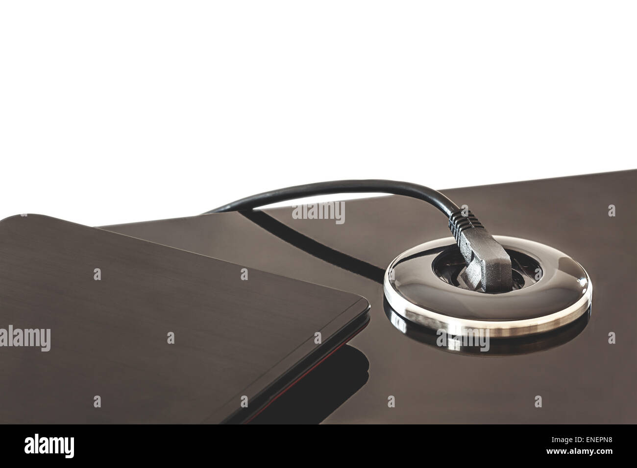Details of an electric plug built in table Stock Photo - Alamy