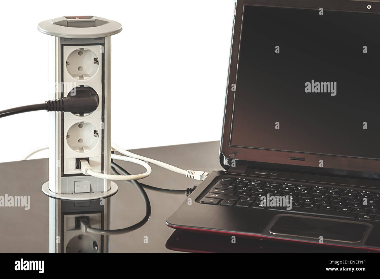 Details of an electric plug built in table Stock Photo - Alamy