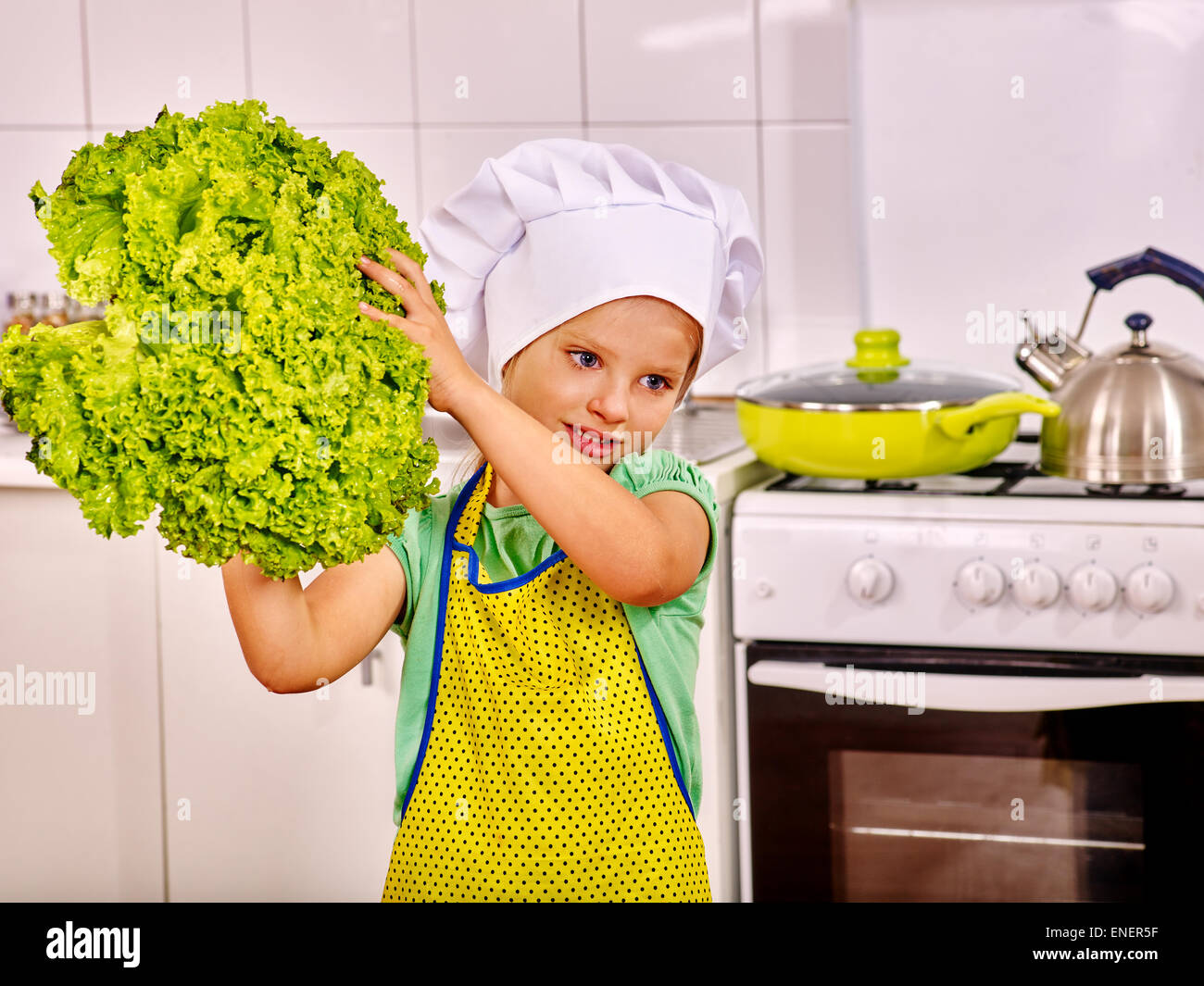 Child cooking at kitchen Stock Photo - Alamy