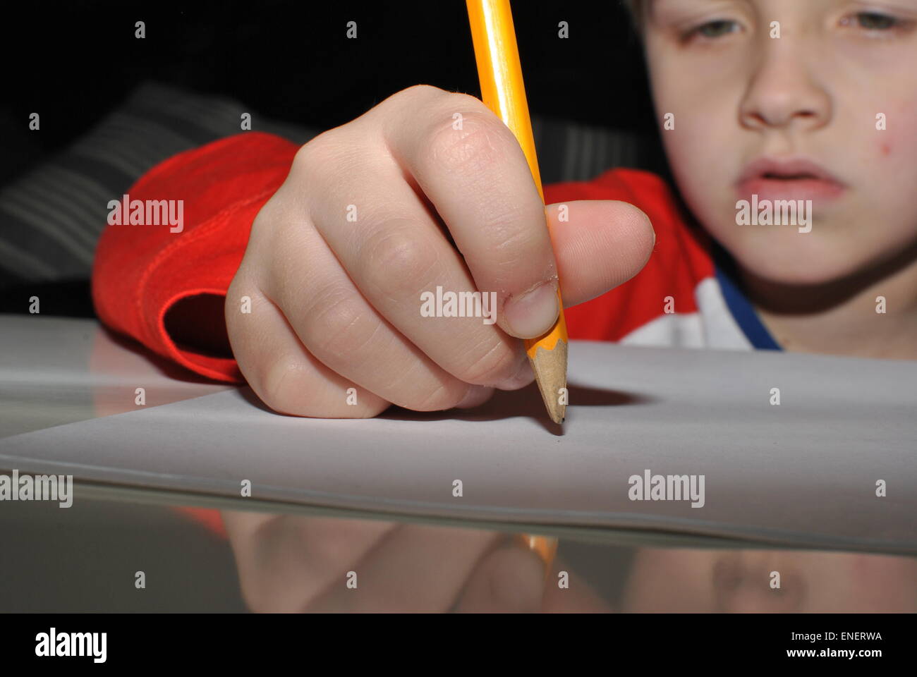 child writing on the white paper Stock Photo - Alamy