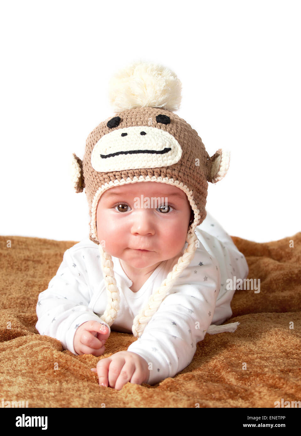 Baby in monkey hat Stock Photo - Alamy
